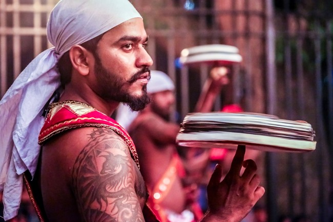 Spinning a Hand Drum During a Sri Lankan Festival