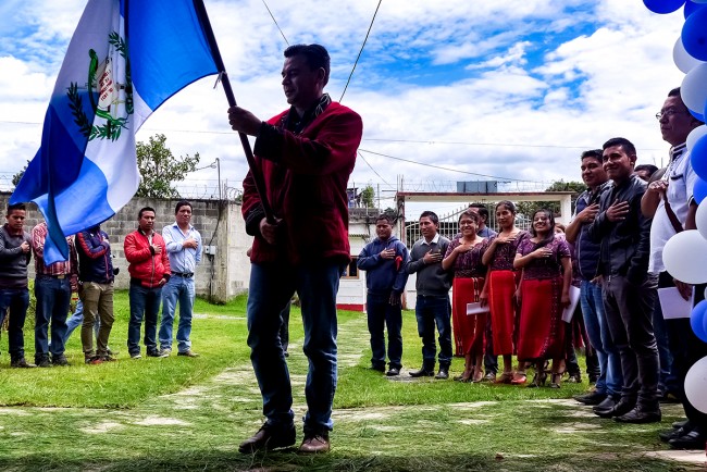 Singing the Guatemalan Anthem at an Independence Day Gathering
