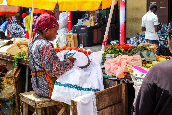 Rwandan Produce Vendor Embroiders Bedsheets