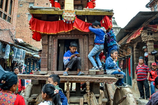 Nepalese Children Play on a Hindu Chariot